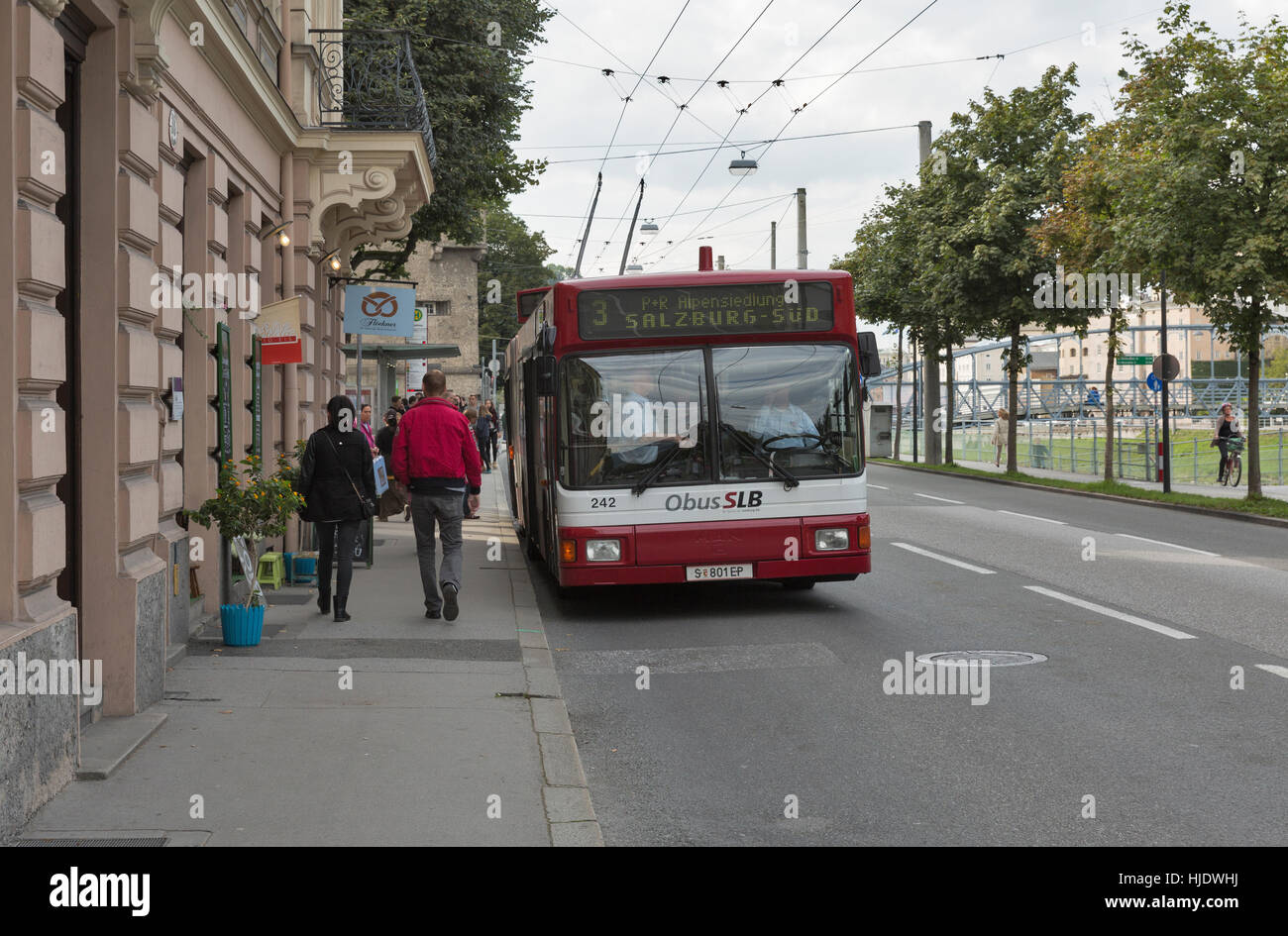 SALZBURG, AUSTRIA - SEPTEMBER 09, 2015: Trolley bus with passengers on ...