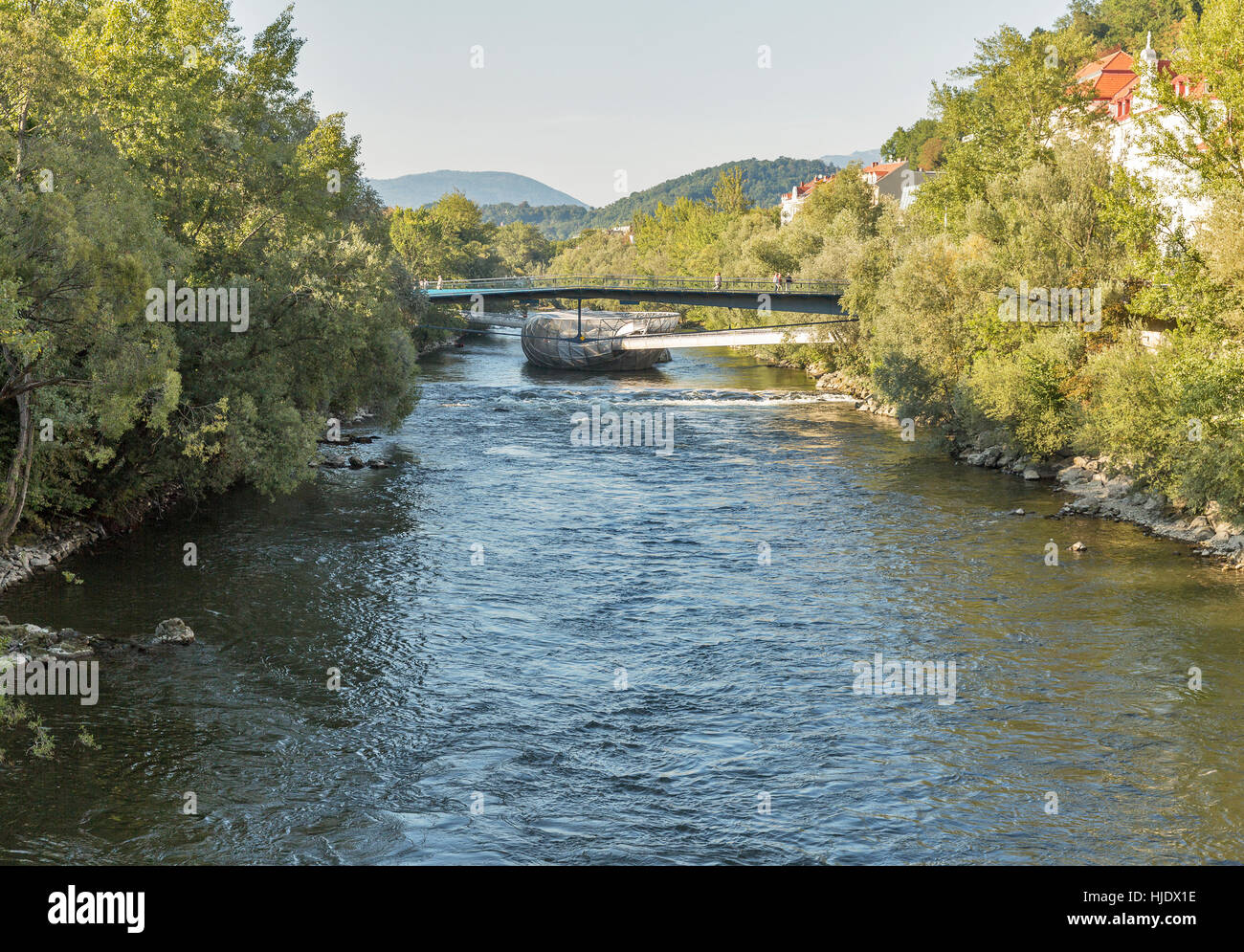 GRAZ, AUSTRIA - SEPTEMBER 12, 2015: Artificial island on the Mur river ...
