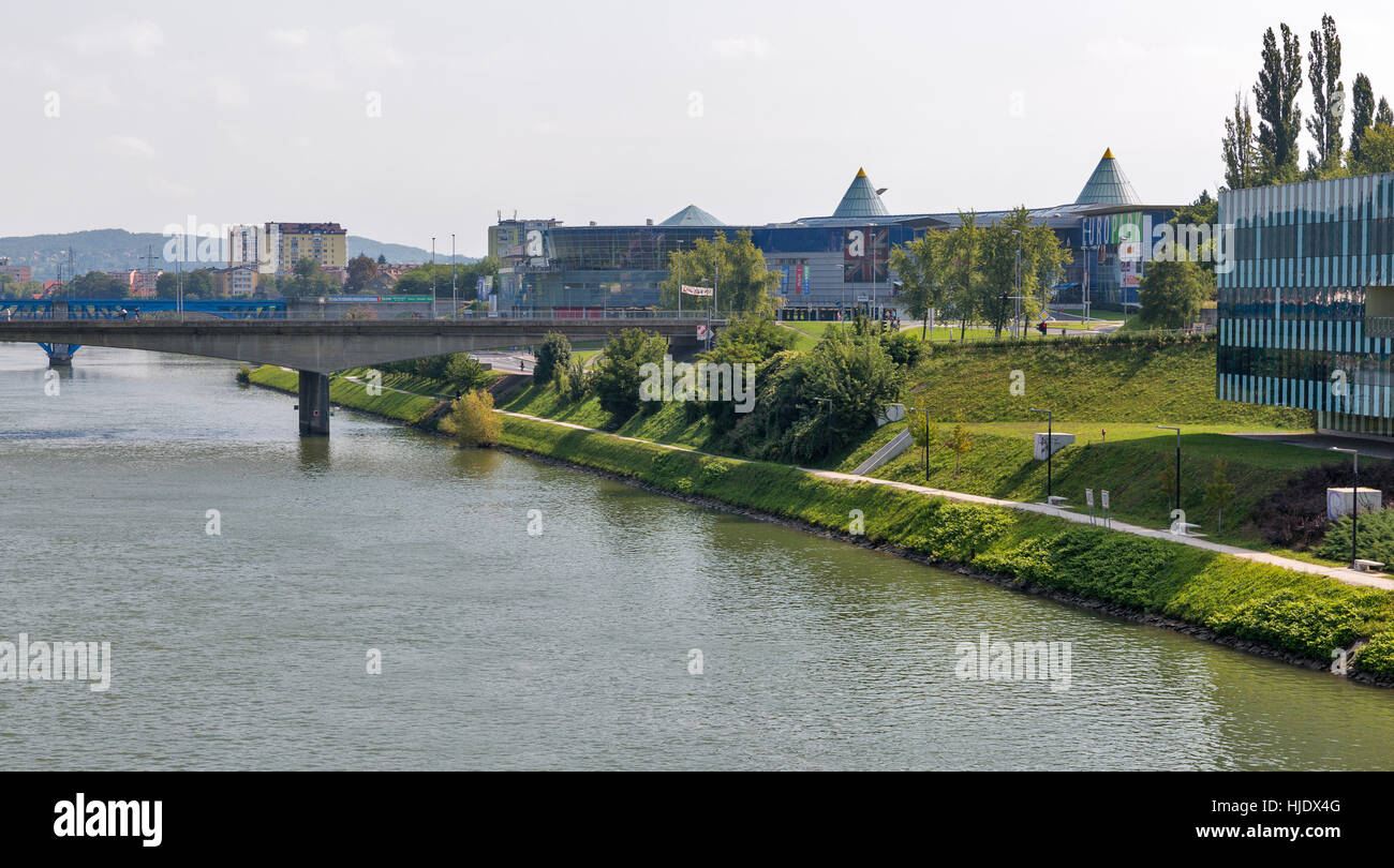 MARIBOR, SLOVENIA - SEPTEMBER 13, 2015: Cityscape with Drava River and ...