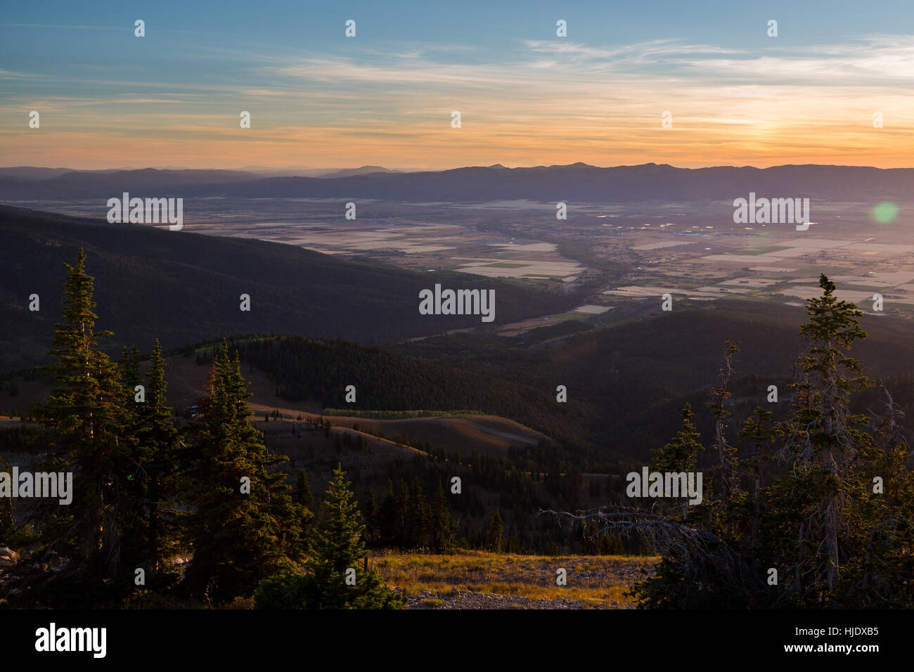 Golden light over Teton Valley, Idaho below Grand Targhee Ski Resort in ...