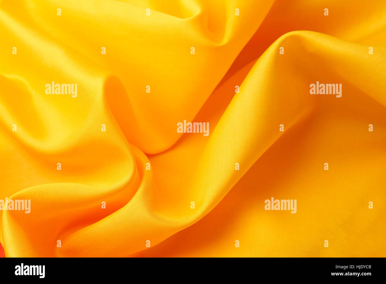 Closeup of lines in yellow silk fabric Stock Photo - Alamy