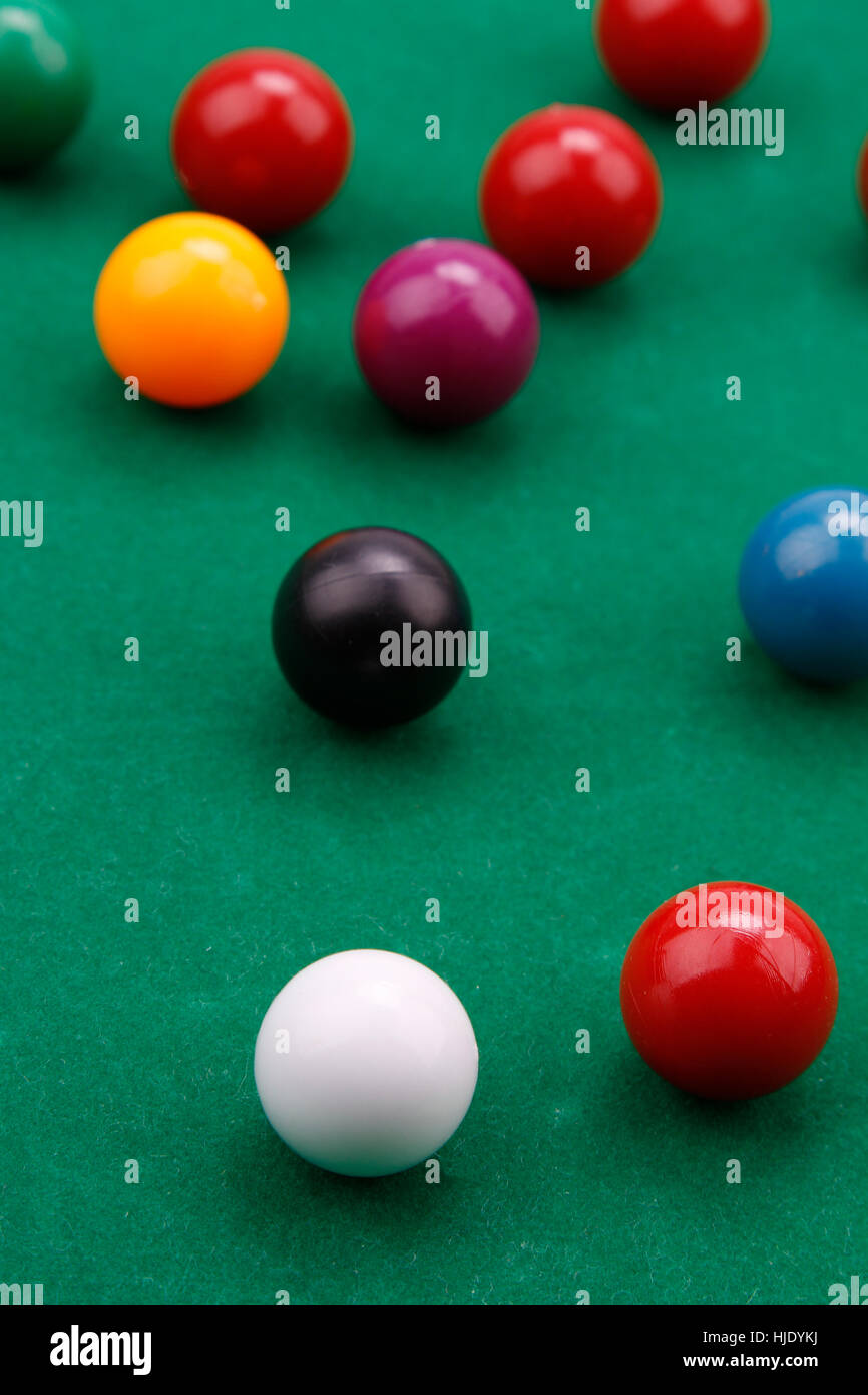 Various color balls on green Stock Photo - Alamy