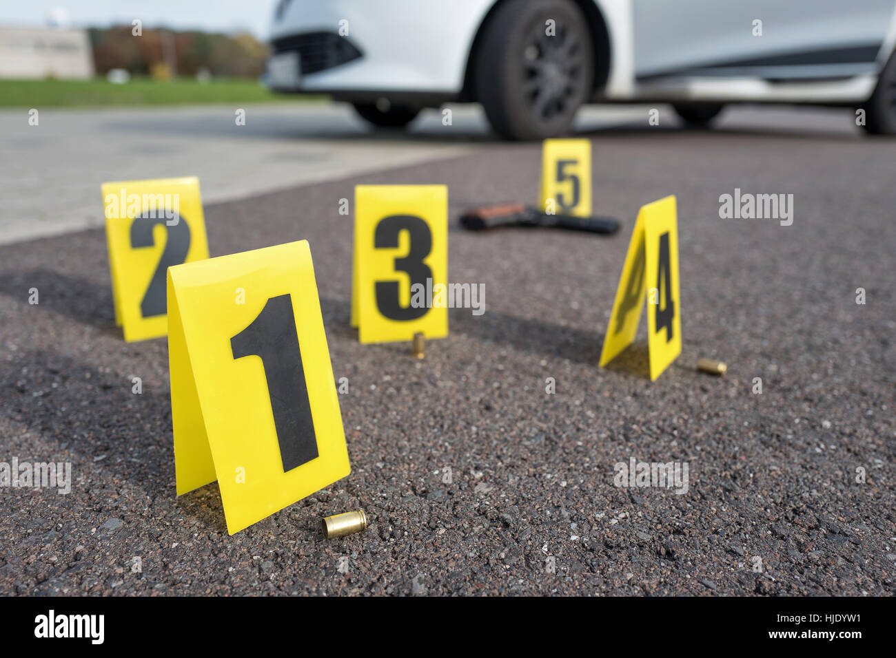 ID tents at crime scene after gunfight Stock Photo - Alamy