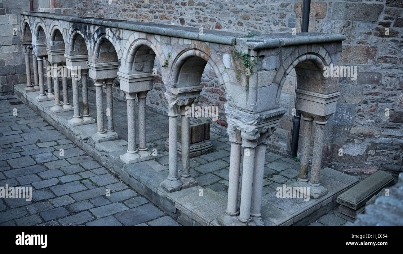 Ancient arcade with narrow columns in Saint-Malo, France Stock Photo ...