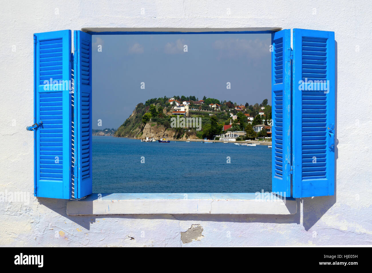 Sea view through traditional greek window Stock Photo - Alamy