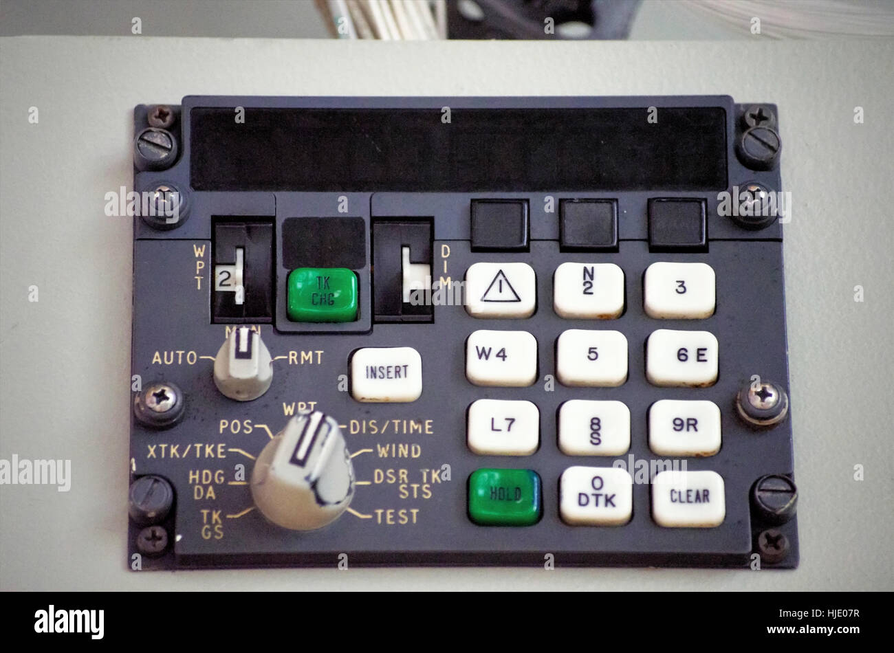A controls panel keypad and dial with wires at the top Stock Photo - Alamy