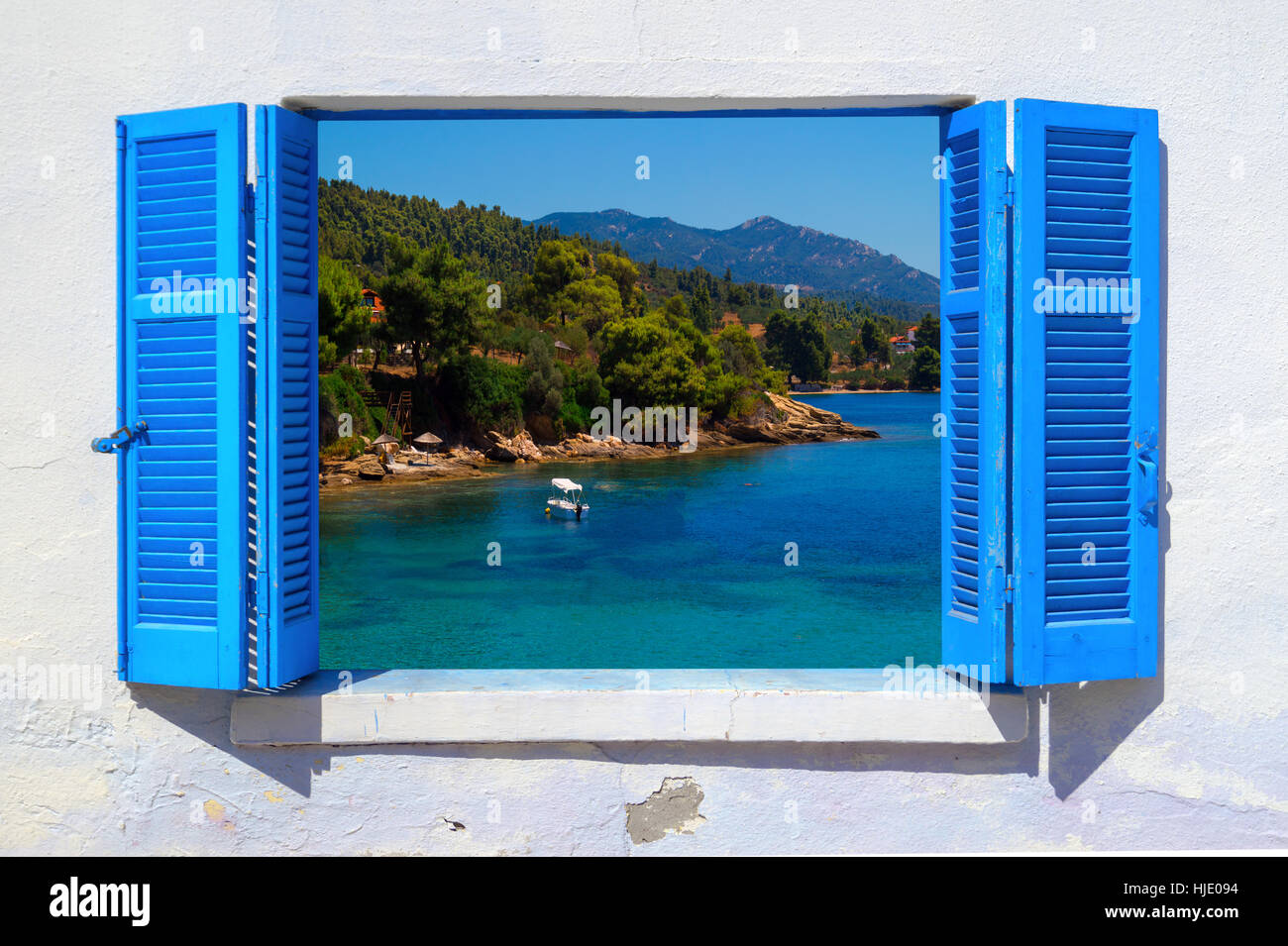 Sea view through traditional greek window Stock Photo - Alamy