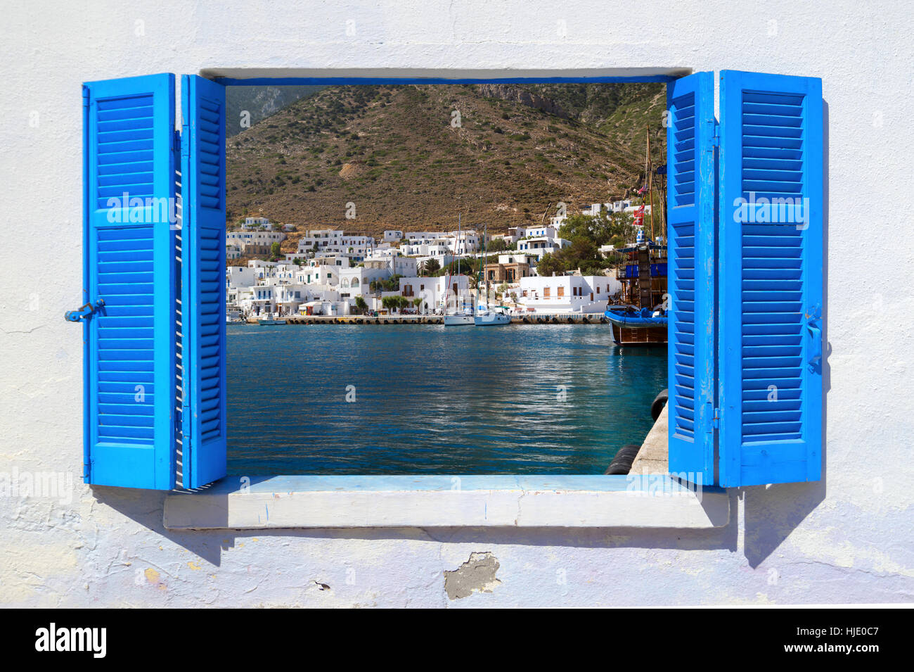 Sea view through traditional greek window Stock Photo - Alamy