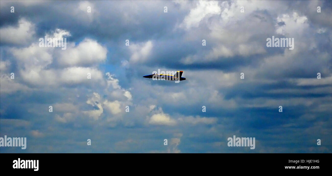 The blue angel jet performers flying in formation over their home base ...