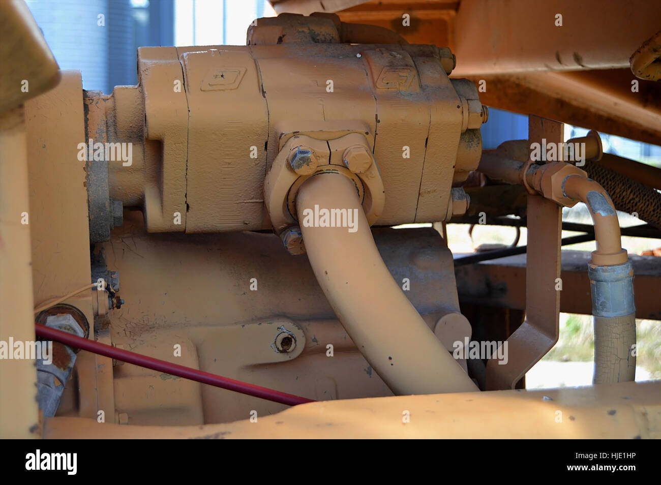 A yellow engine compartment of a loader Stock Photo - Alamy
