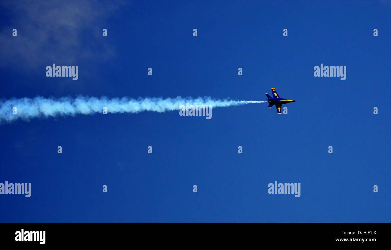 The blue angel jet performers flying in formation over their home base ...