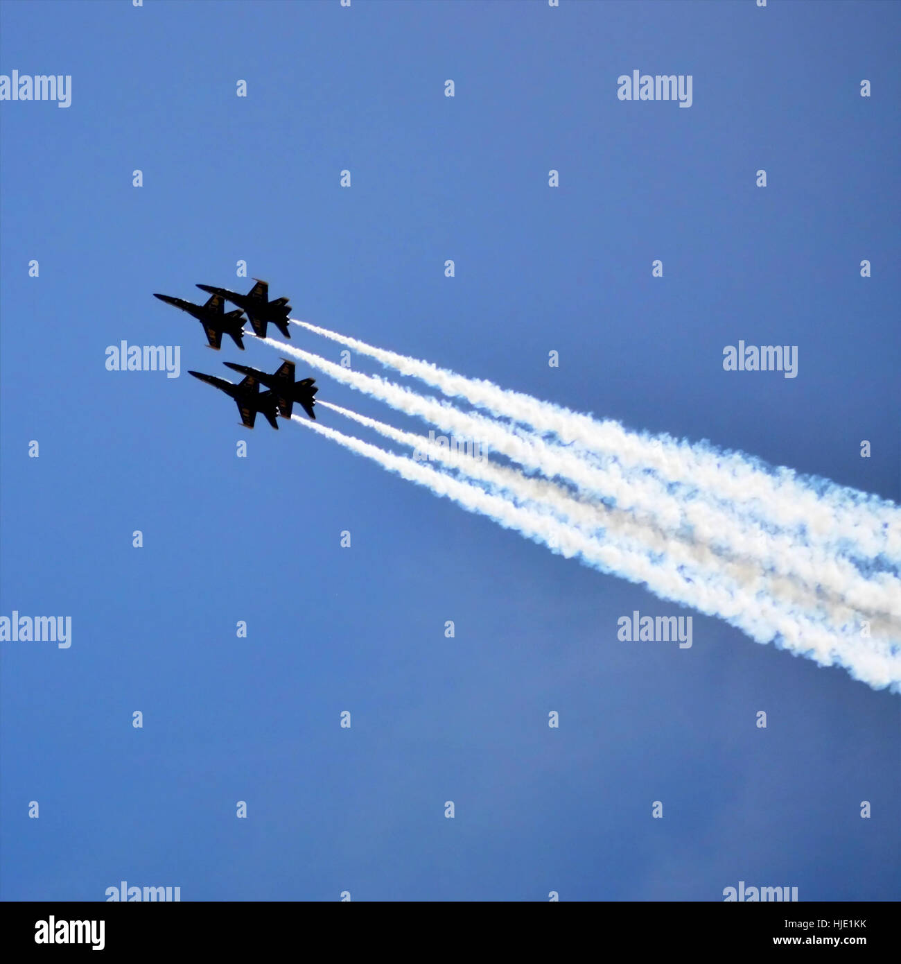 The blue angel jet performers flying in formation over their home base ...