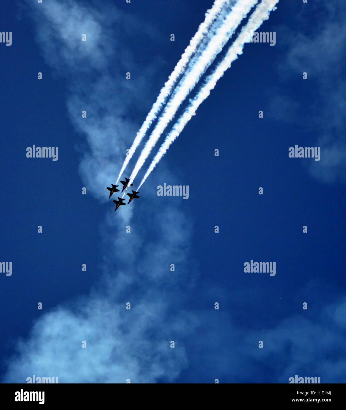 The blue angel jet performers flying in formation over their home base ...
