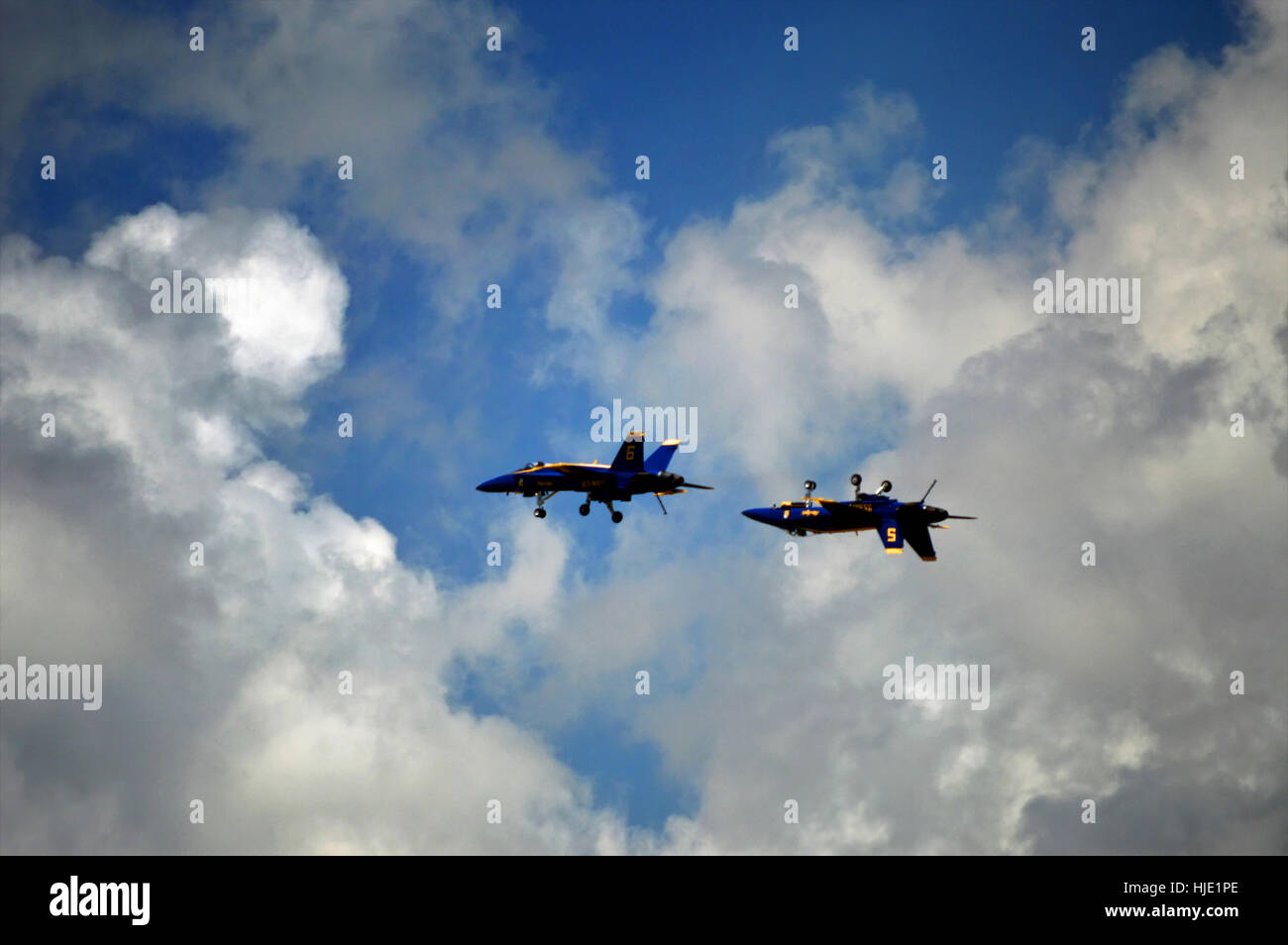 The blue angel jet performers flying in formation over their home base ...