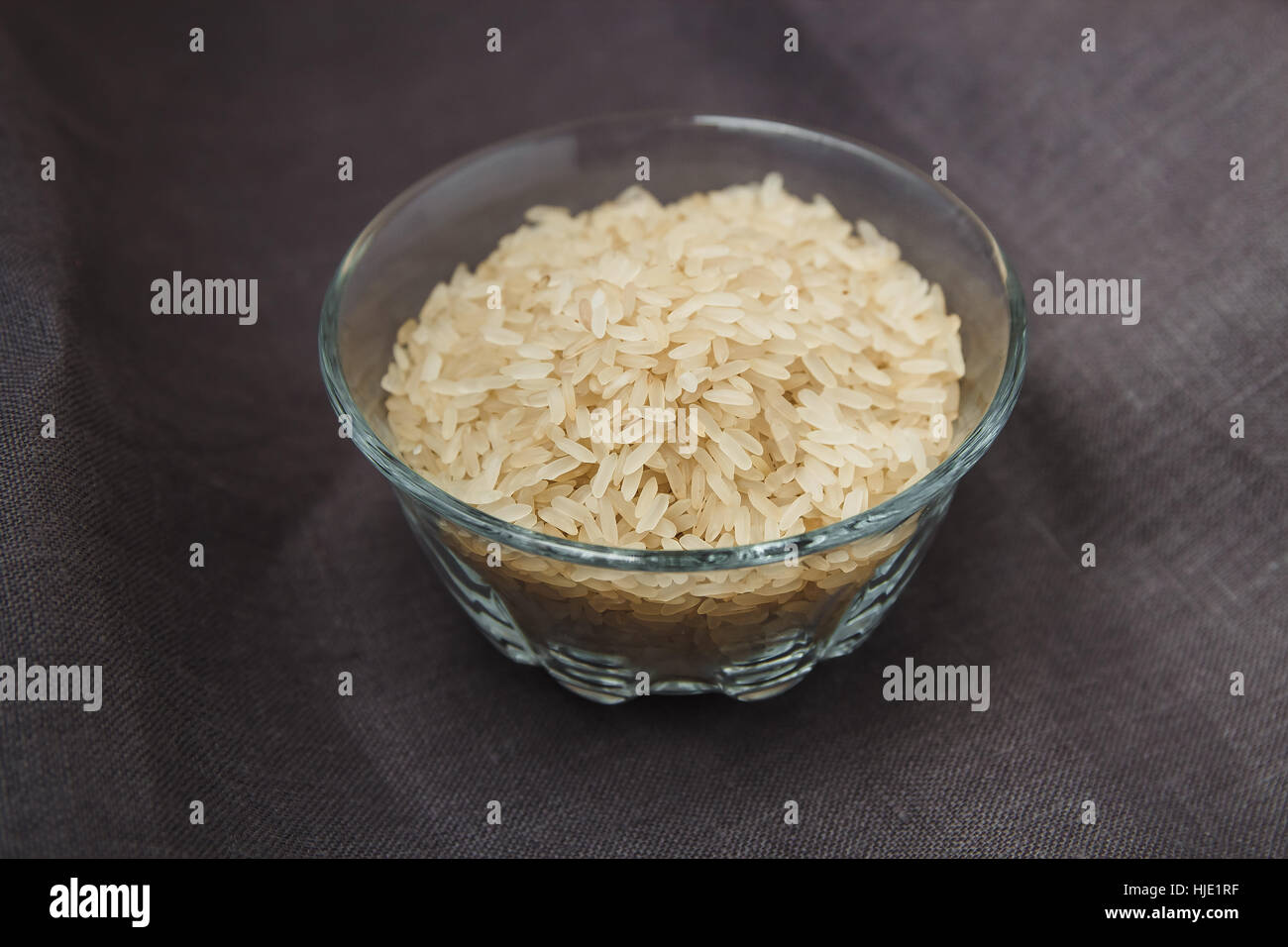 bowl of rice on gray surface Stock Photo - Alamy