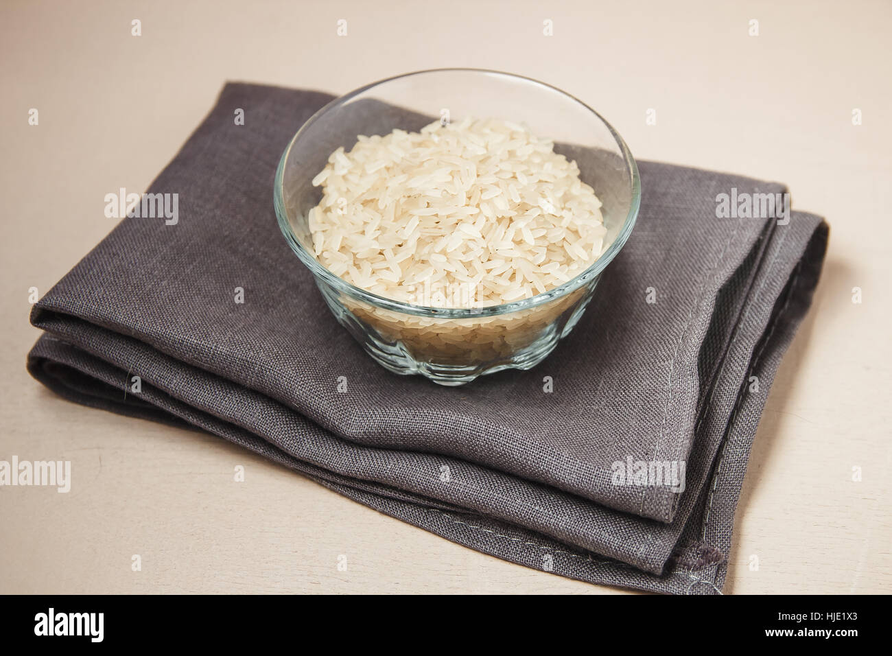 bowl of rice on gray surface Stock Photo - Alamy