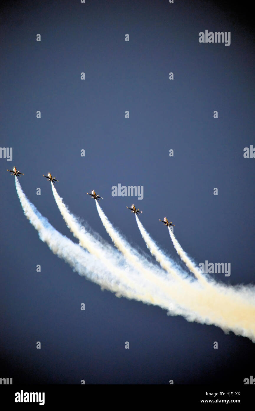 The blue angel jet performers flying in formation over their home base ...