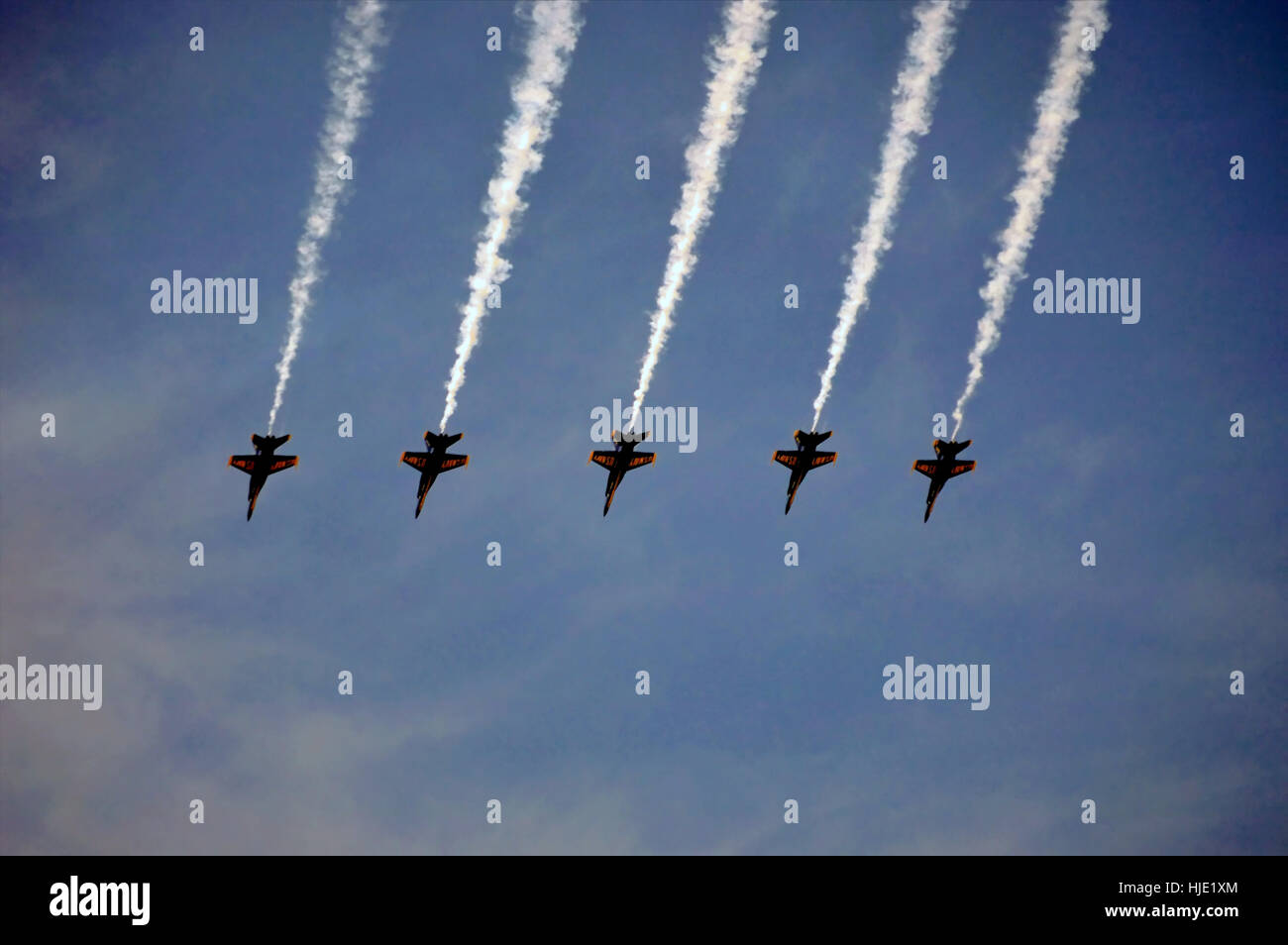 The blue angel jet performers flying in formation over their home base ...