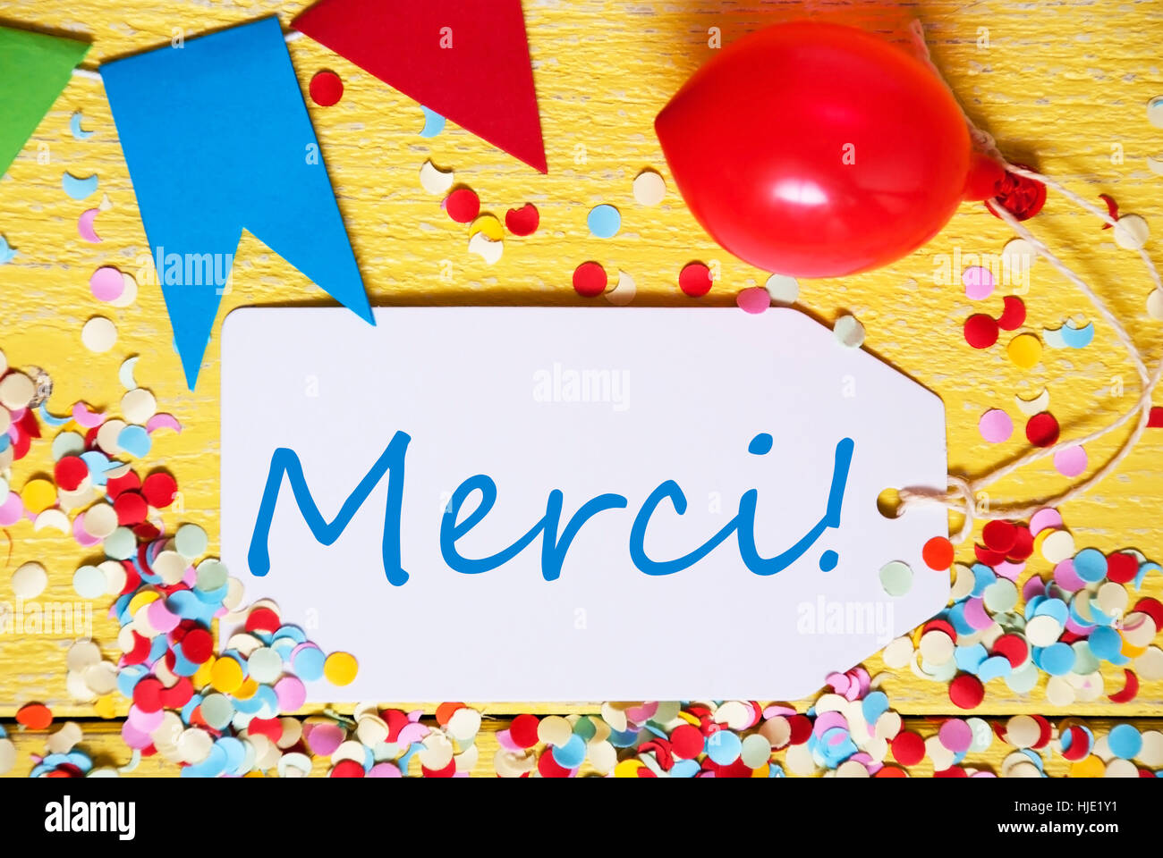 Party Label, Red Balloon, Merci Means Thank You Stock Photo - Alamy