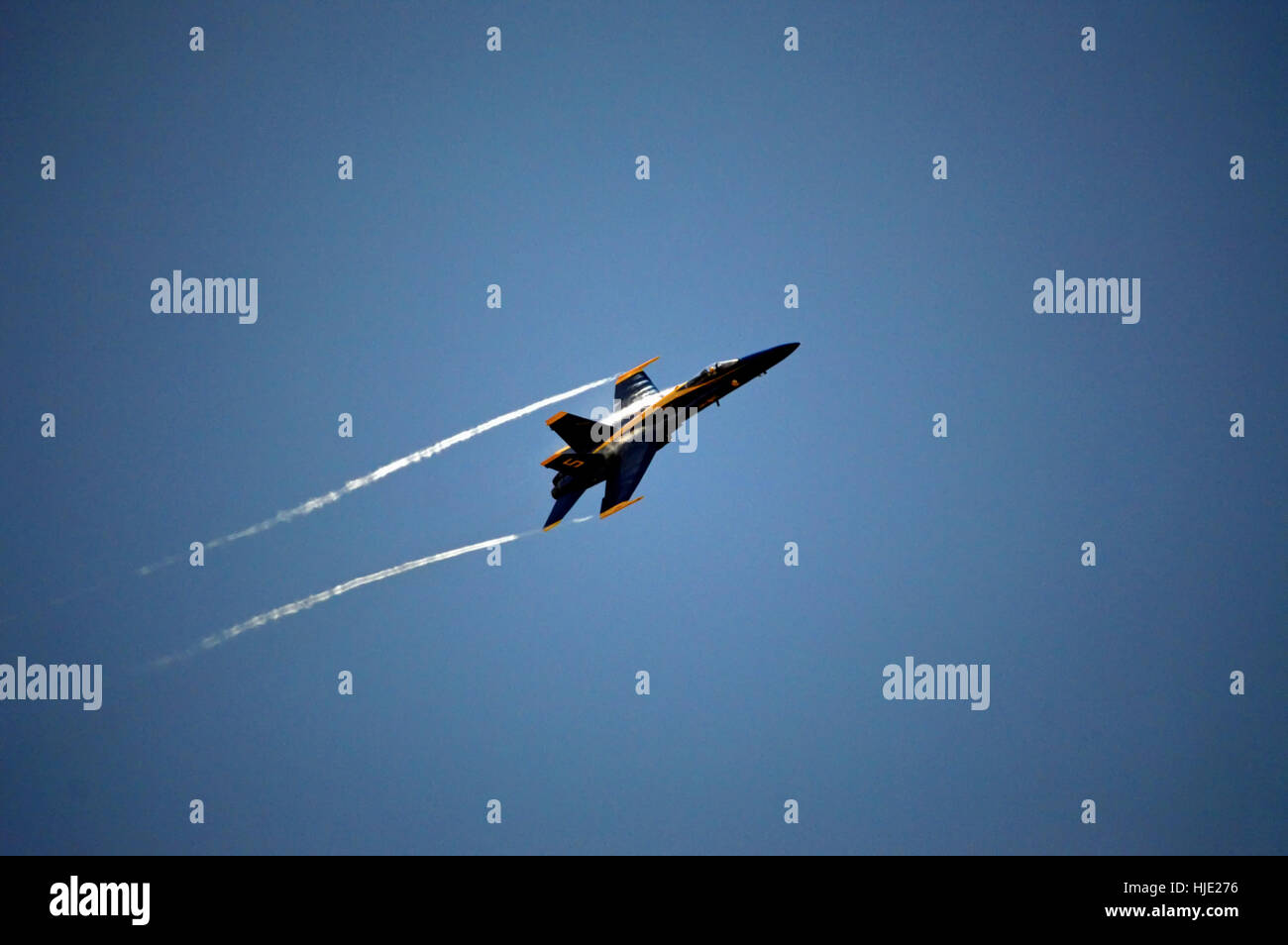 The blue angel jet performers flying in formation over their home base ...