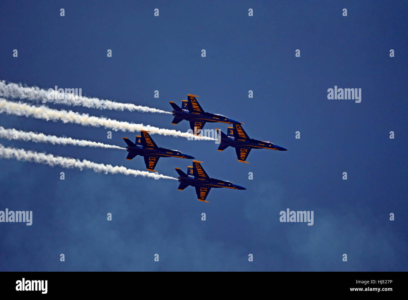 The blue angel jet performers flying in formation over their home base ...