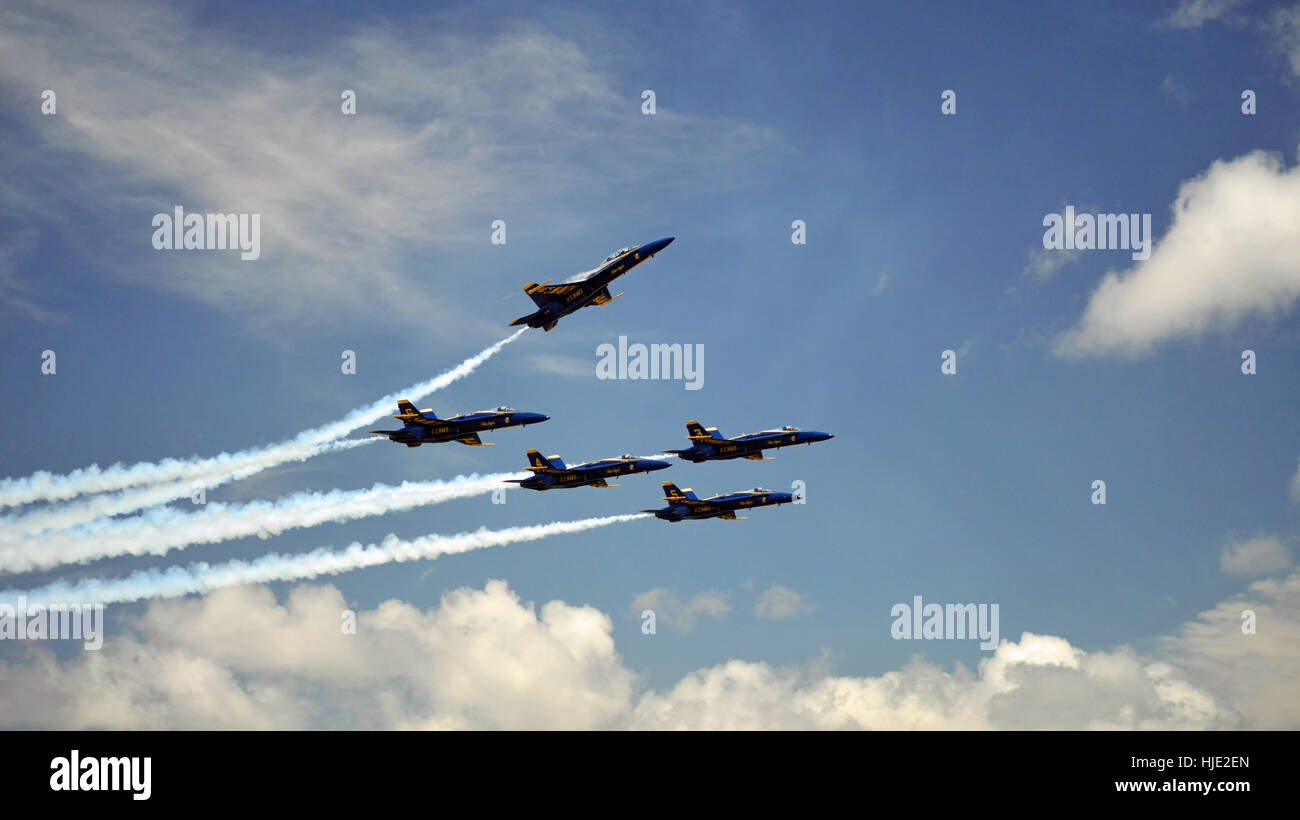 The blue angel jet performers flying in formation over their home base ...