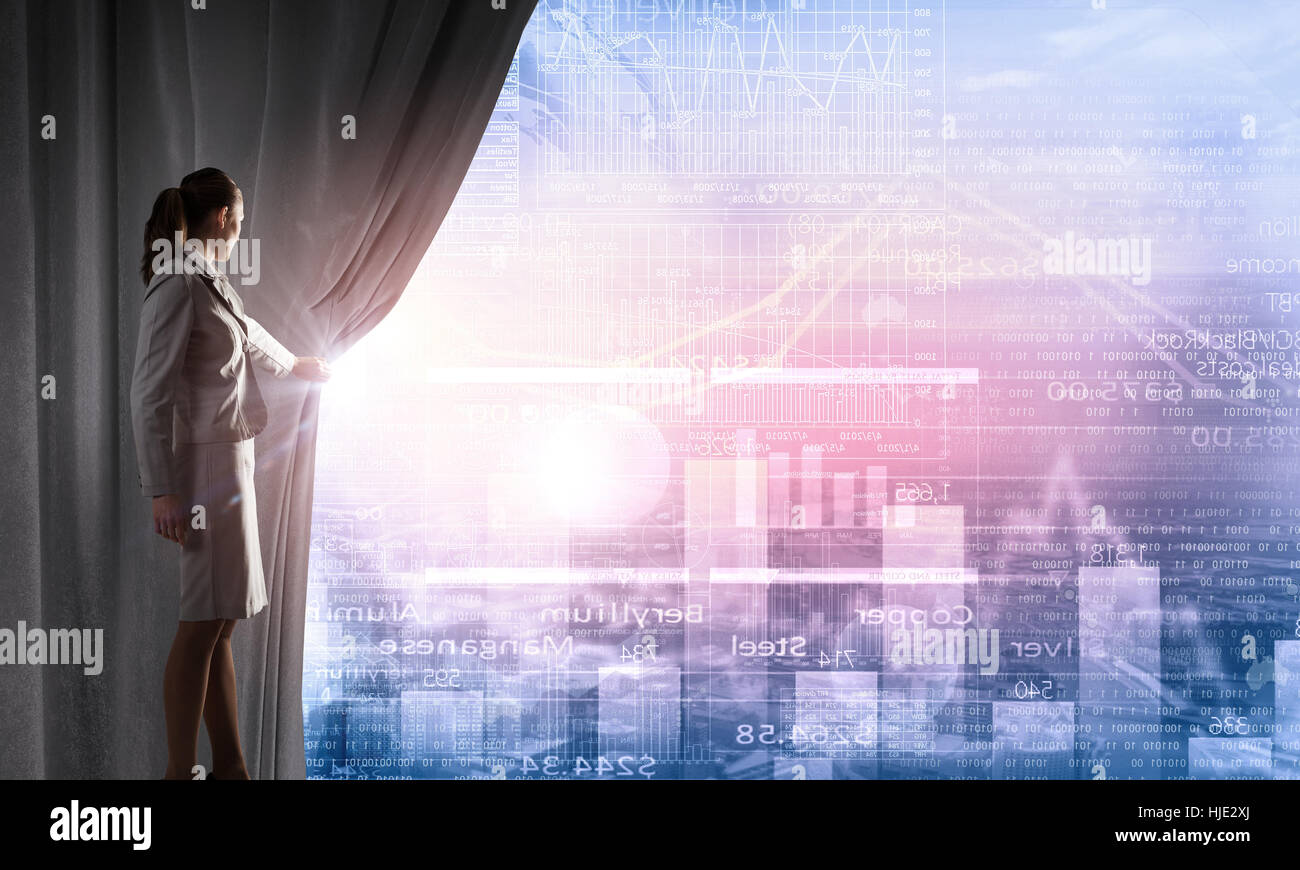 Young businesswoman opening curtain and presenting sales report hi-res ...