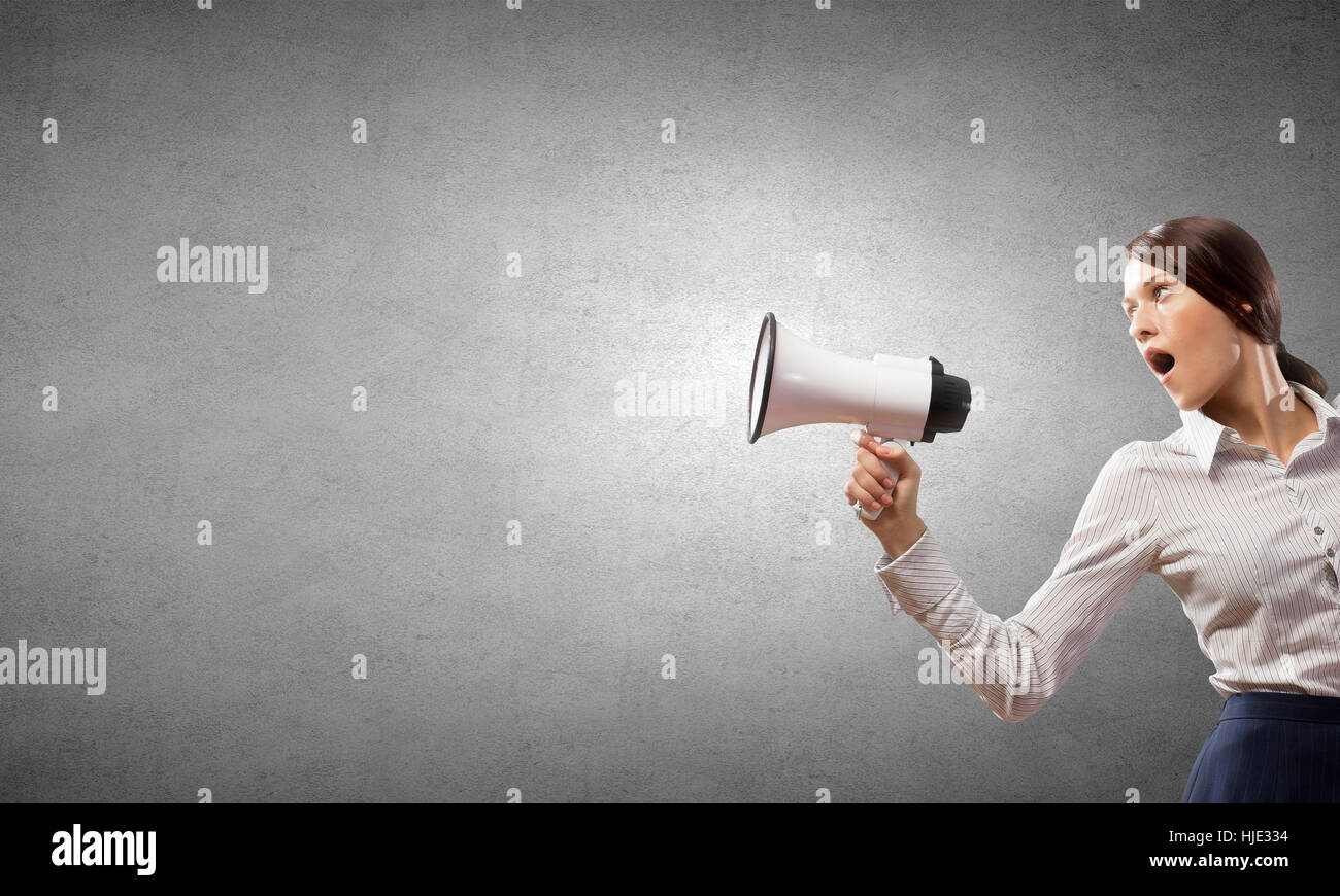 Angry woman screaming loudspeaker hi-res stock photography and images ...