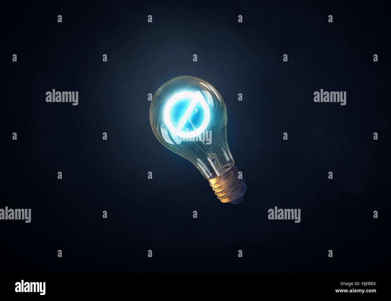 Glass glowing light bulb with prohibition sign inside hi-res stock ...