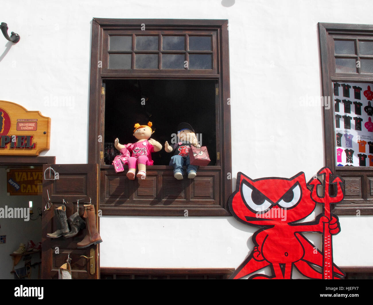 Dolls in shop window hi-res stock photography and images - Alamy