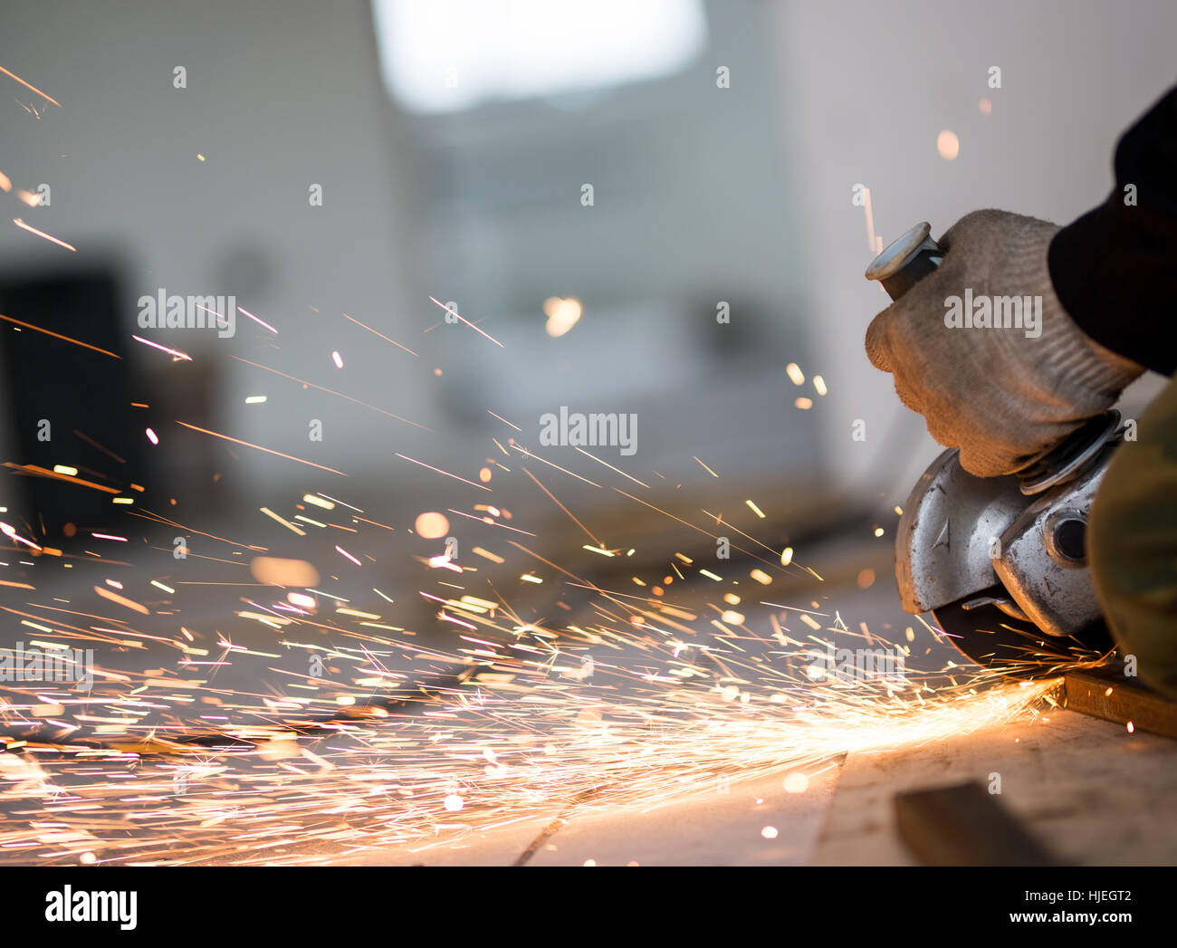 Cutting metal with angle grinder Stock Photo - Alamy