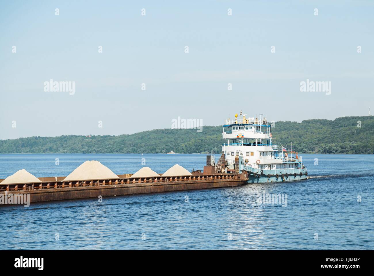 Cargo ship barge loaded with sand Stock Photo - Alamy