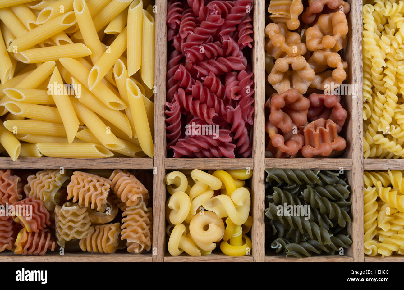 Variety of types, colors and shapes of Italian pasta. Dry pasta ...