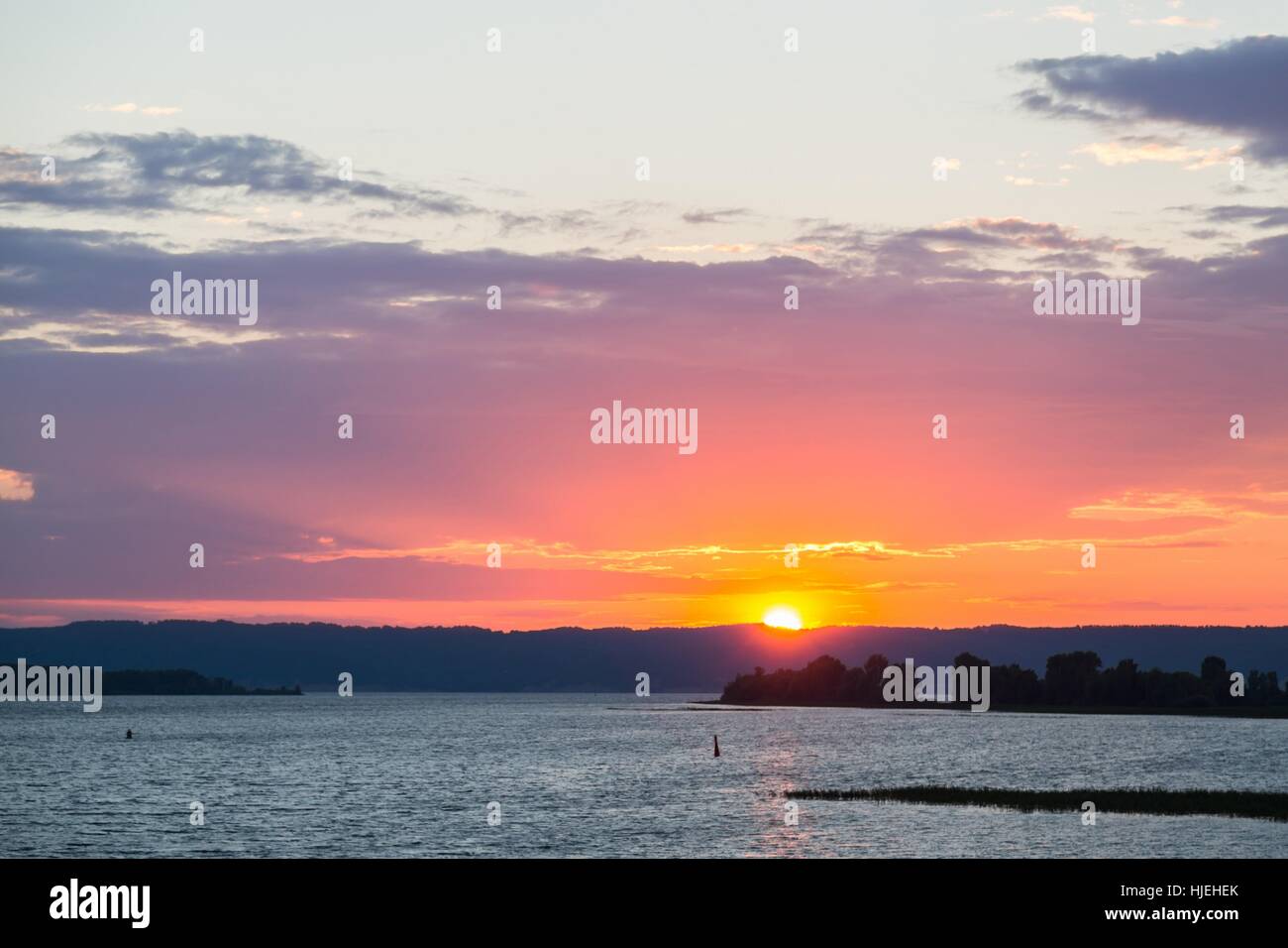 Sunset on the river Stock Photo - Alamy