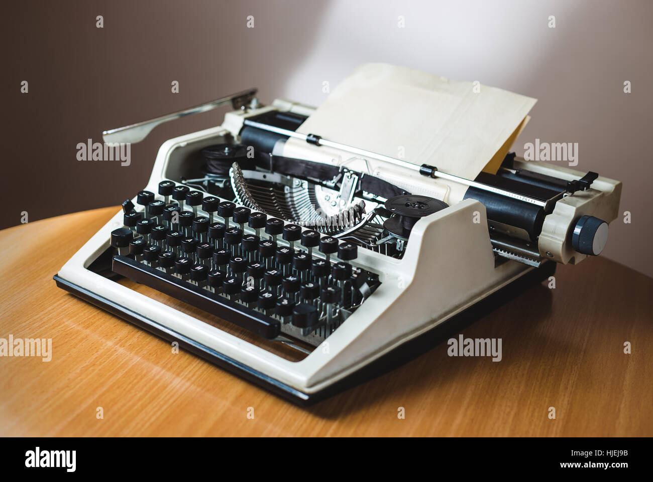 Retro old typewriter with paper sheet Stock Photo - Alamy