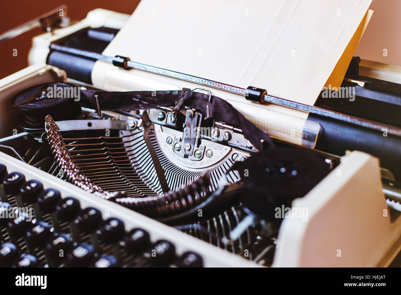 Retro old typewriter with paper sheet Stock Photo - Alamy