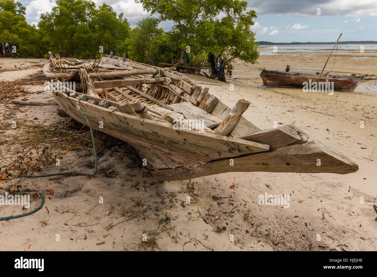Primitive fisherman wooden boat on beach, made by native people, Uzi ...