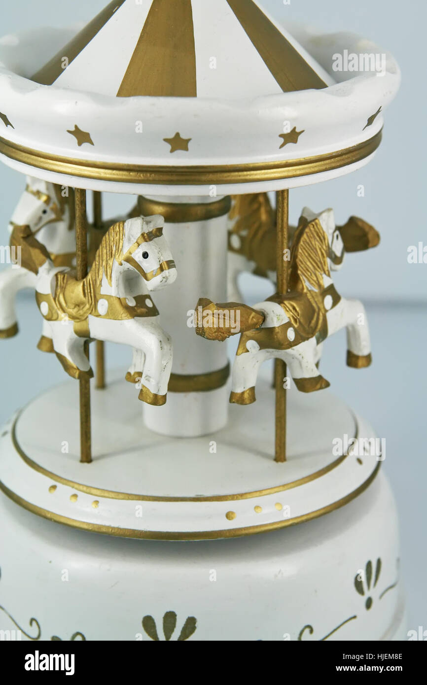 Small carousel figures. Carousel toy Stock Photo - Alamy