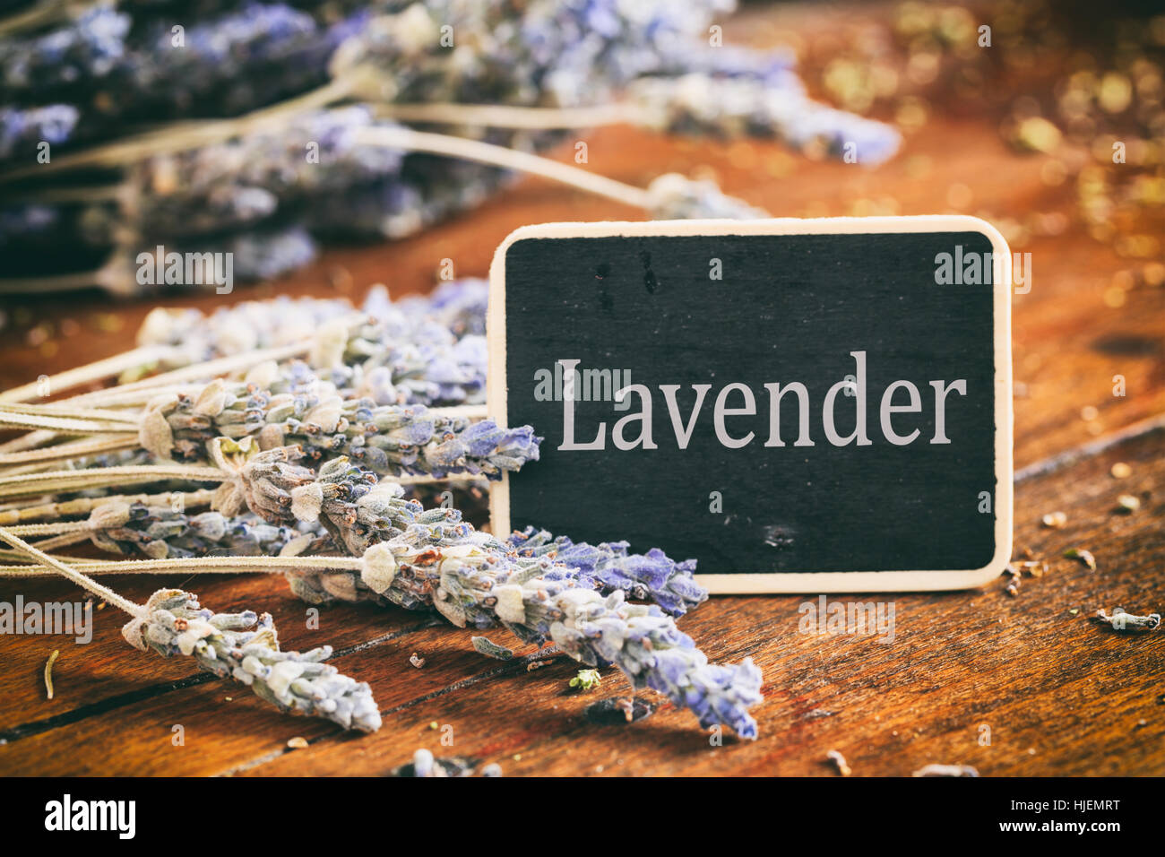 Lavender bunch and label on wooden background Stock Photo - Alamy