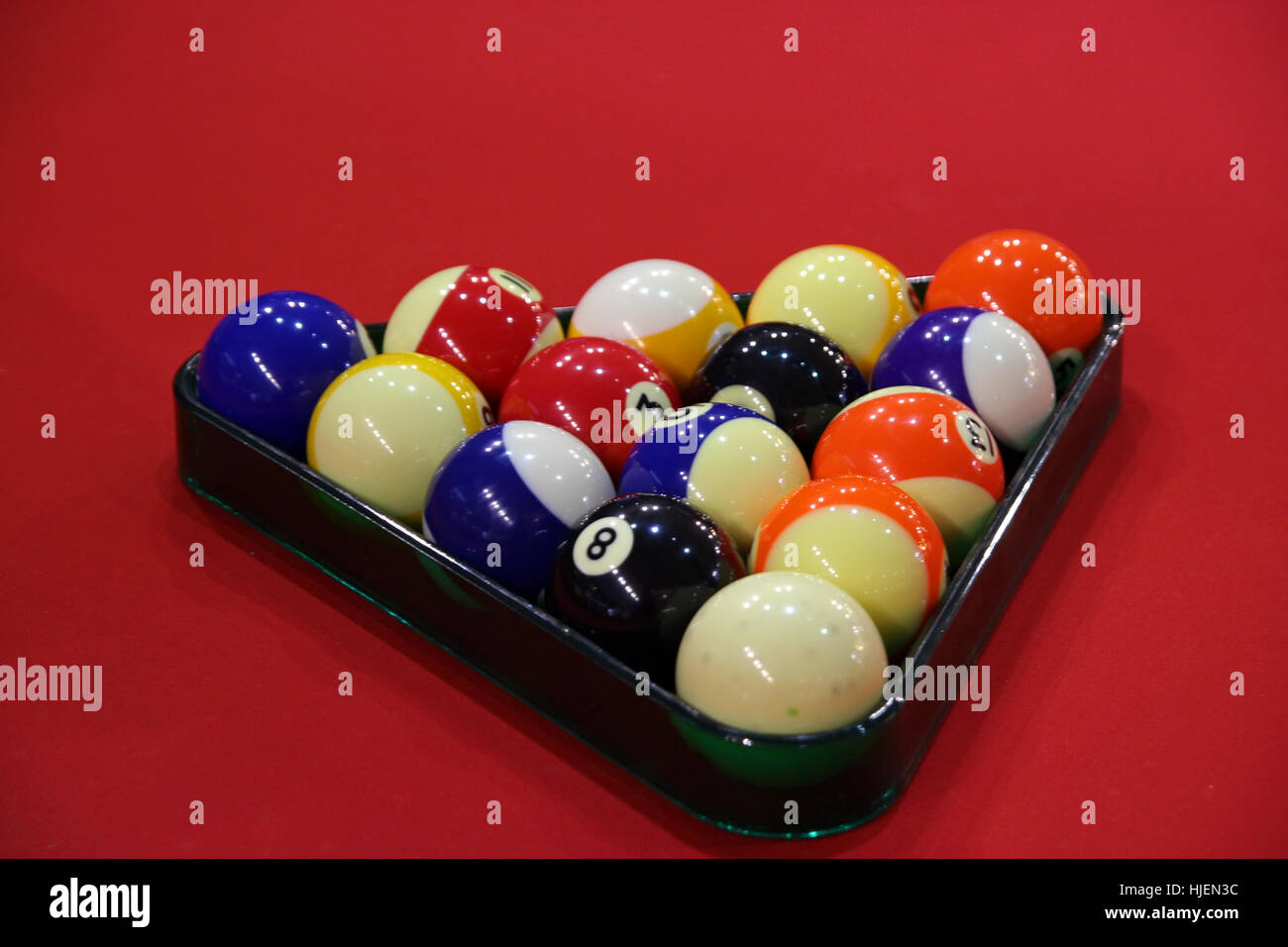 Pool balls. Pool table with red cloth Stock Photo - Alamy