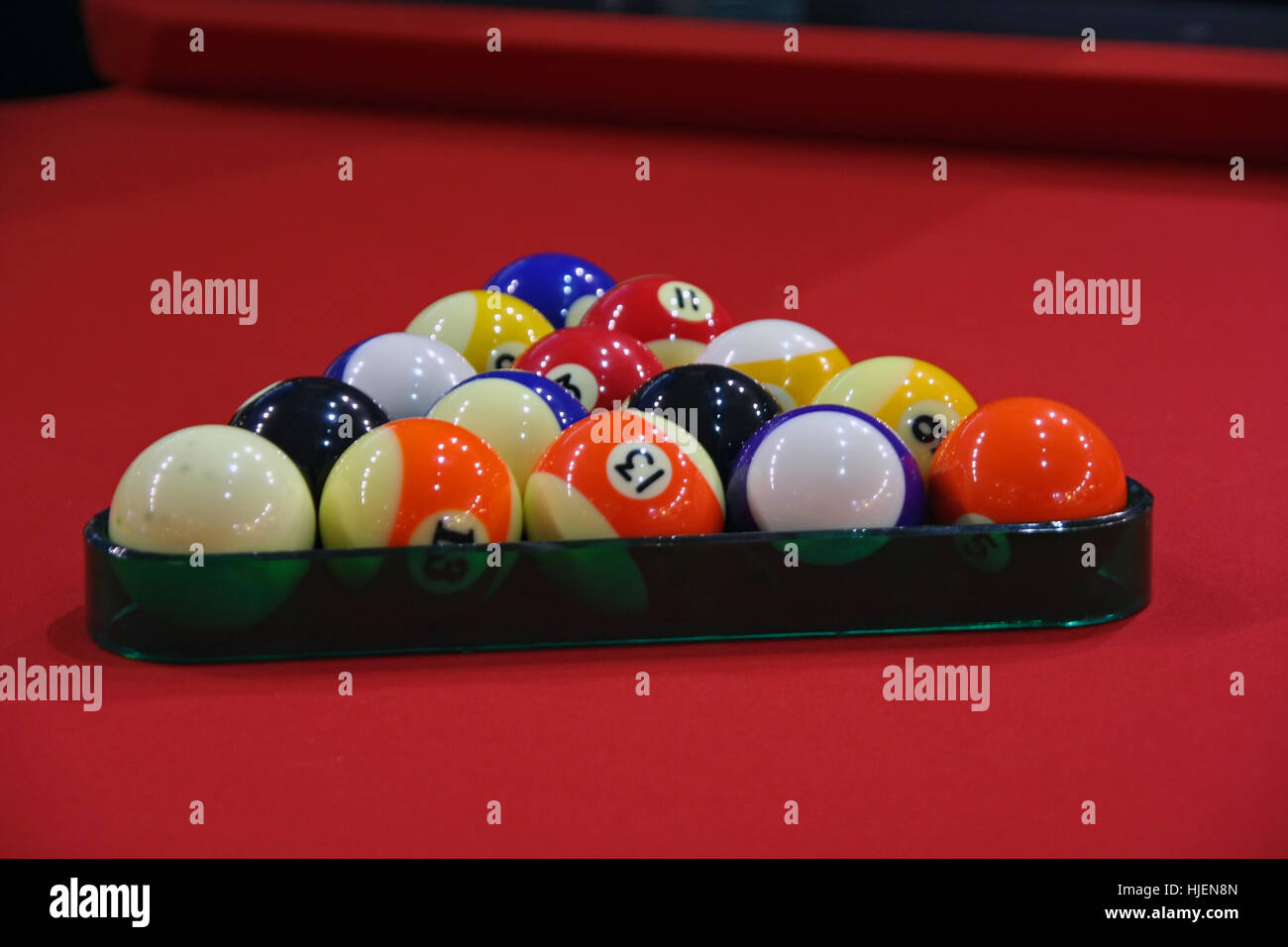 Pool balls. Pool table with red cloth Stock Photo - Alamy