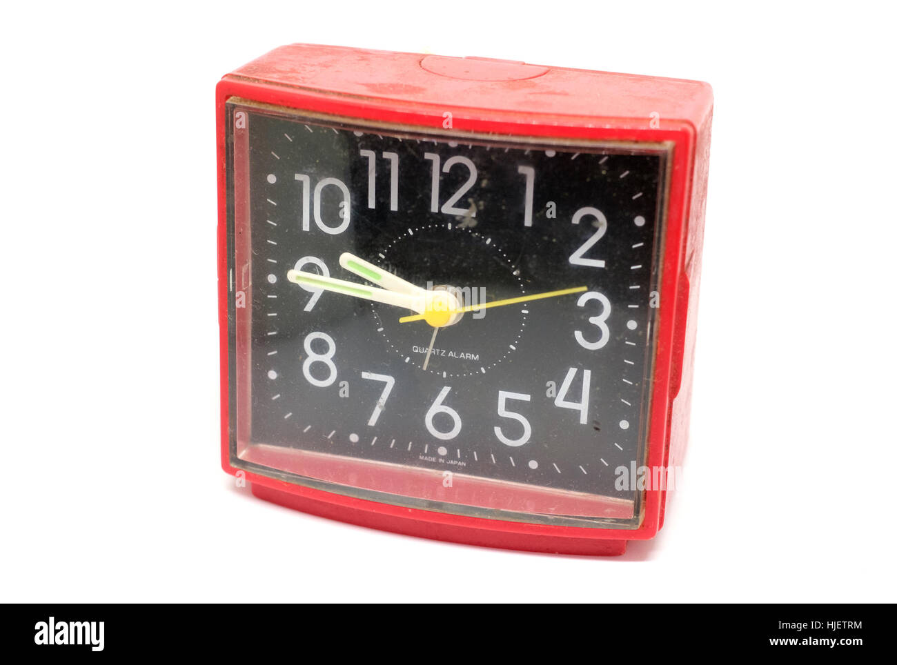 Red alarm clock cut out isolated on white background Stock Photo - Alamy
