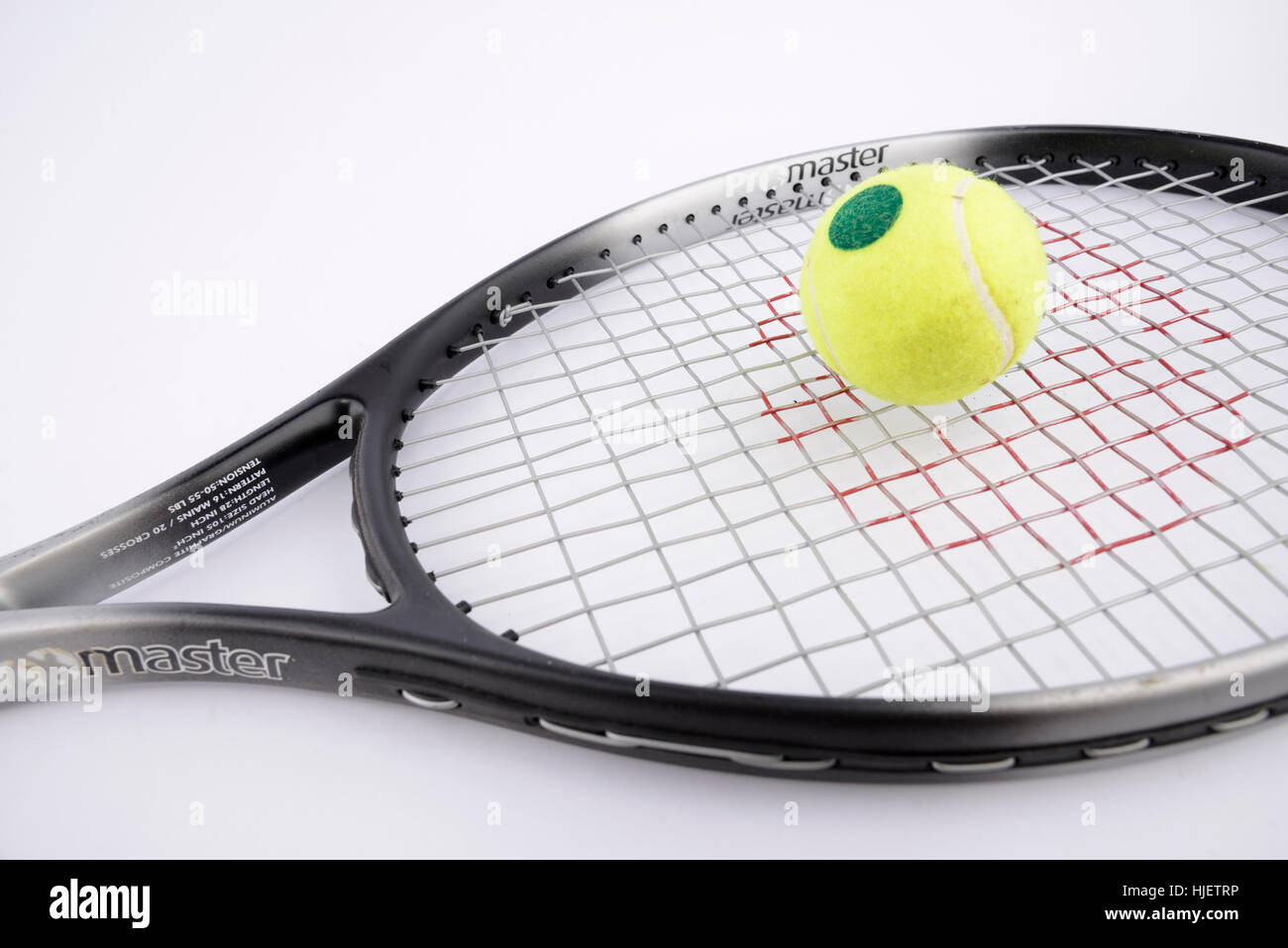 Tennis racket with ball Stock Photo - Alamy