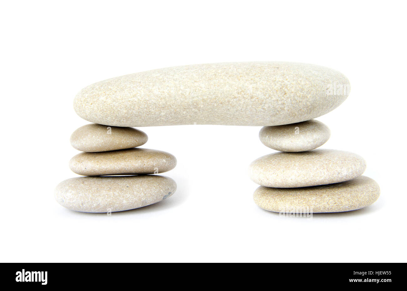Stack of balanced stones on a white background Stock Photo - Alamy