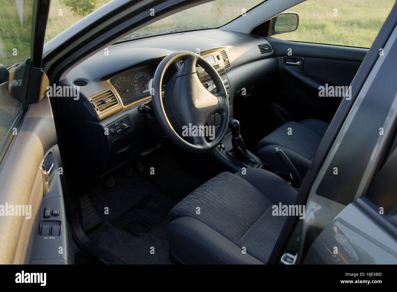 Interior of a car with open door Stock Photo - Alamy