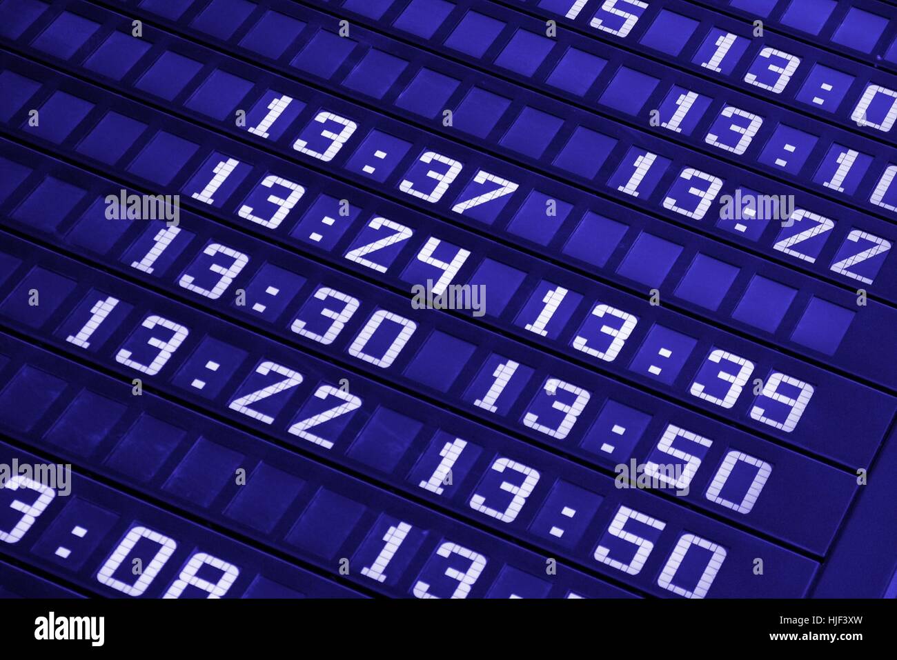 Schedule boards with timings in blue tone Stock Photo - Alamy