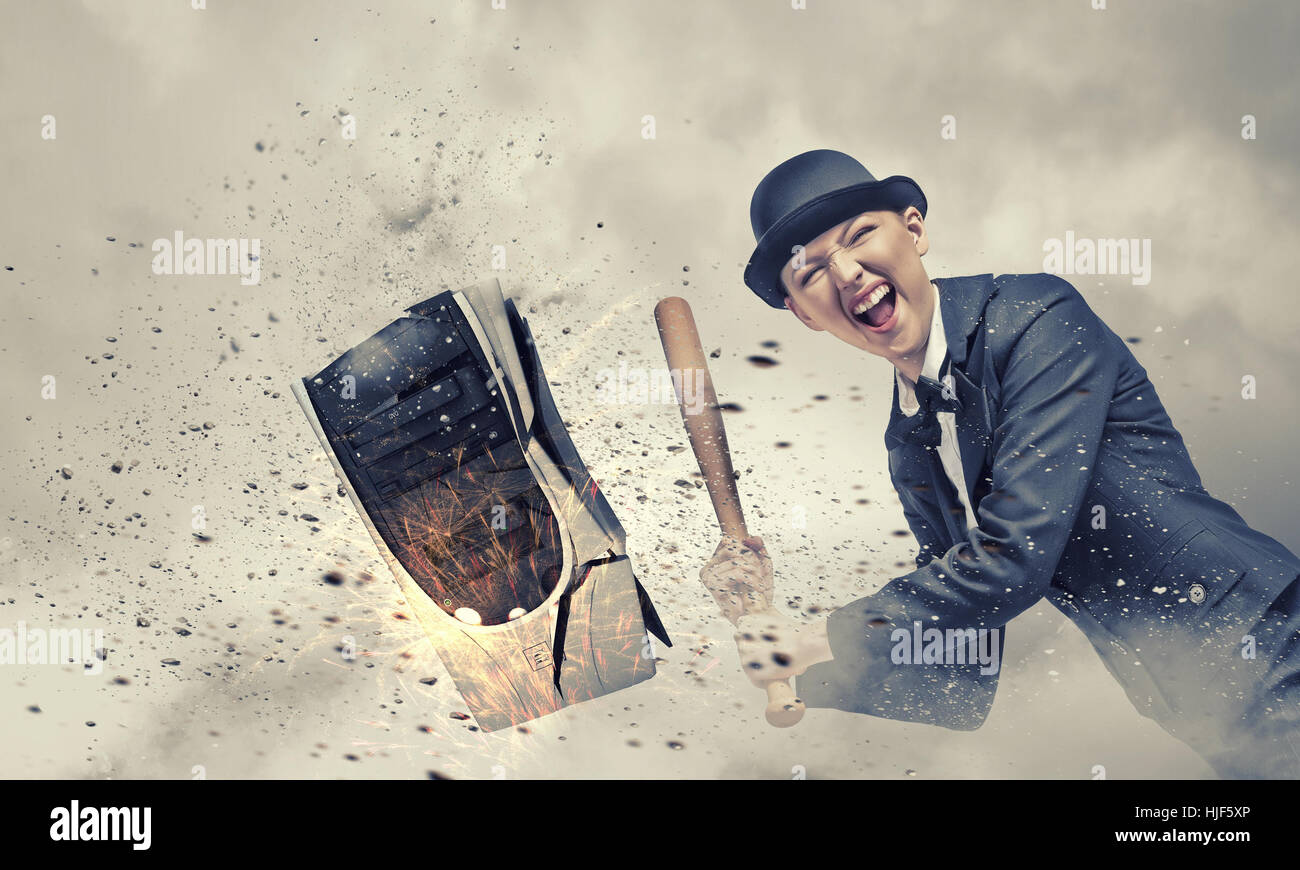 Young crazy woman damaging computer processor with baseball bat Stock ...