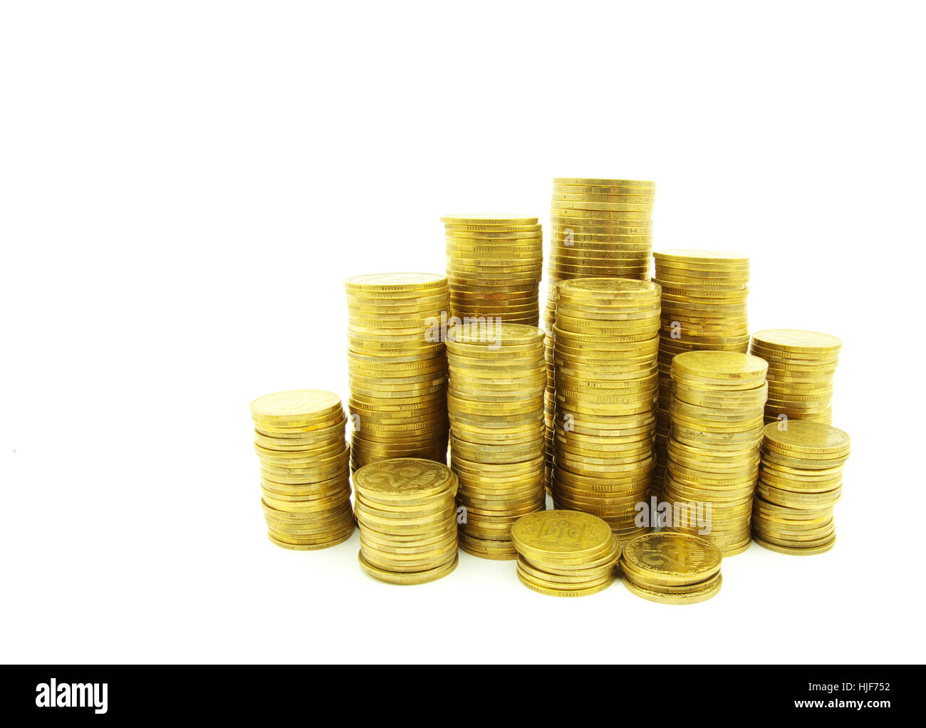 towers of coins isolated on a whiteness Stock Photo - Alamy