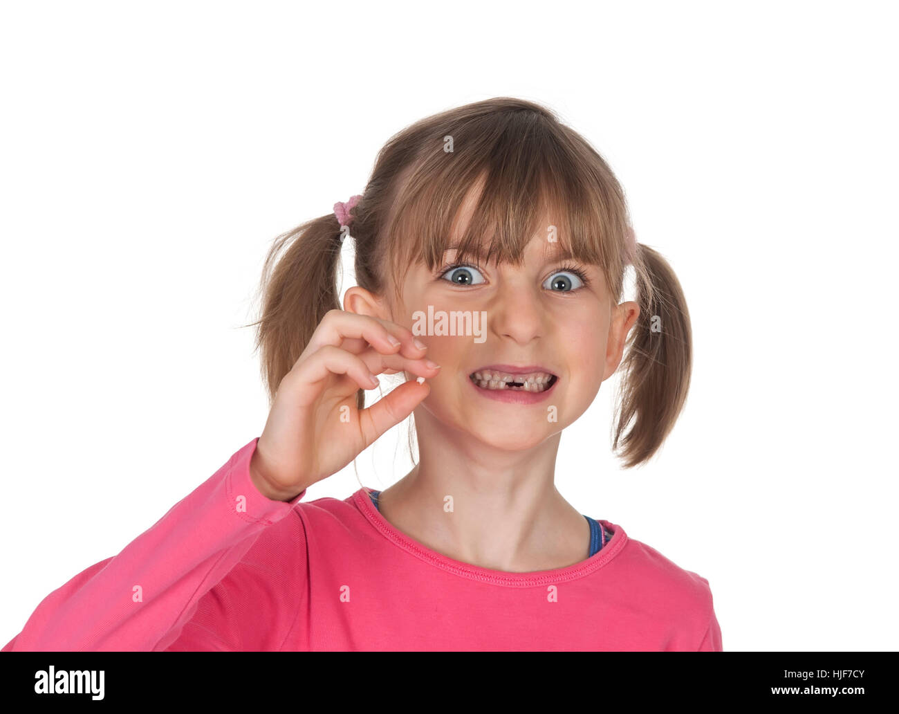 girl showing milk teeth Stock Photo - Alamy