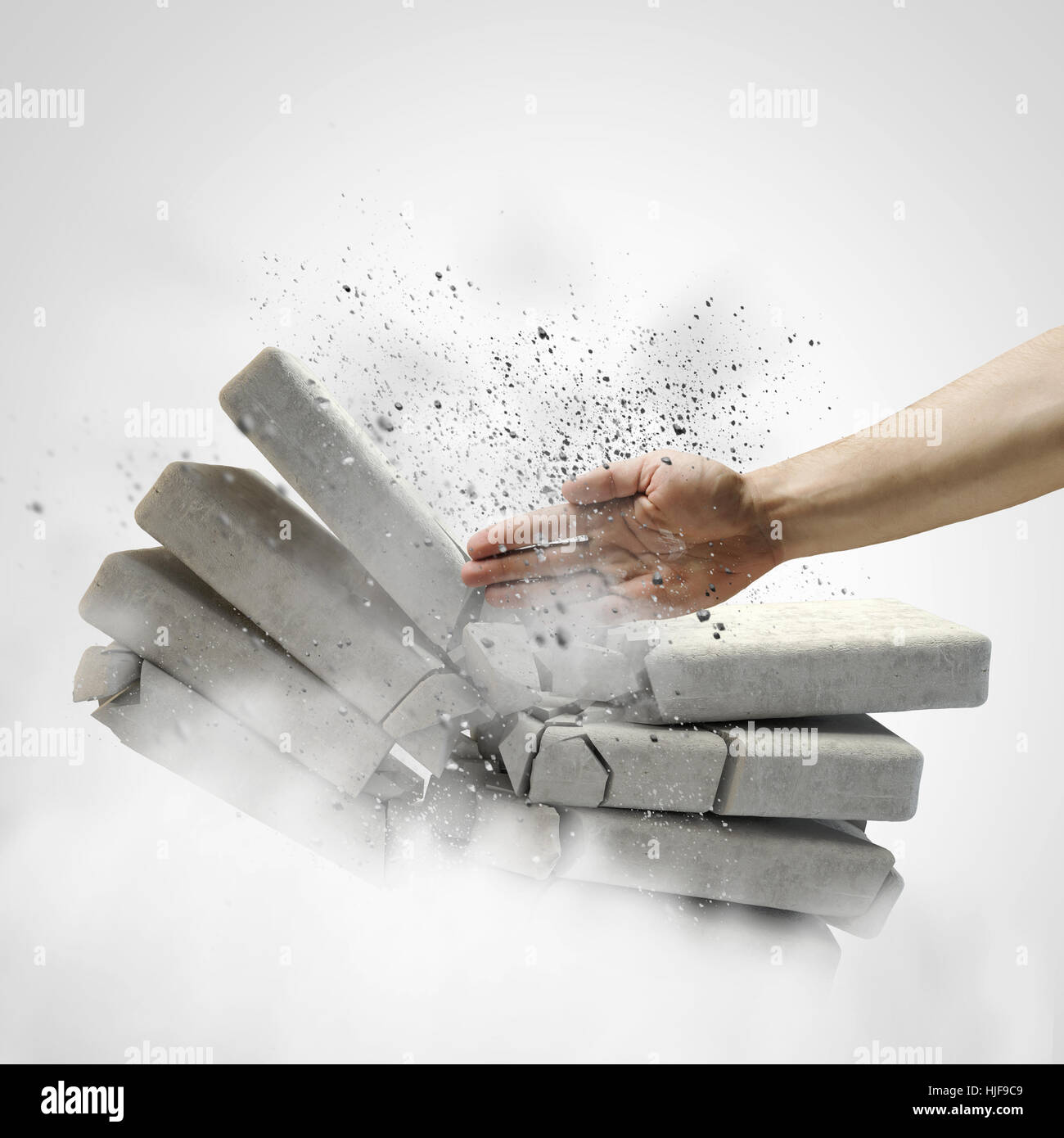 Human hand breaking brick hi-res stock photography and images - Alamy
